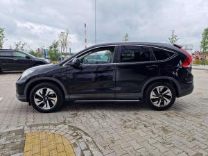 Black Honda CR-V 2014 in Vilnius, with an engine capacity of 2.20 L and mileage of 270 thousand km for 11999 €, photo 7 on AUTOMOTO.COM.LV