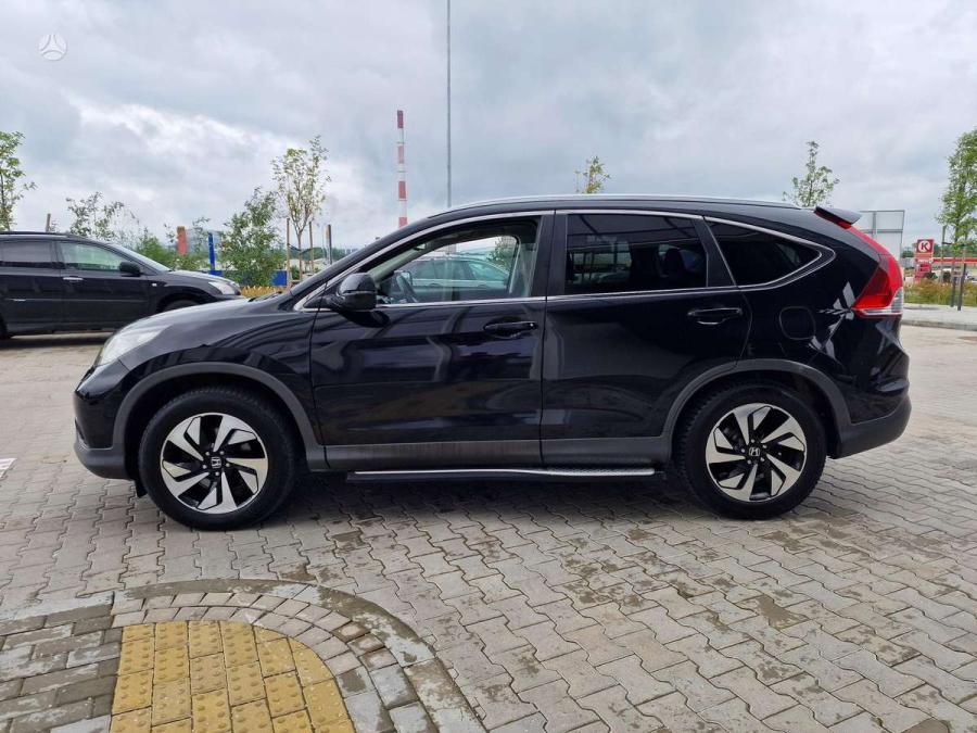 Black Honda CR-V 2014 in Vilnius, with an engine capacity of 2.20 L and mileage of 270 thousand km for 11999 €, photo 7 on AUTOMOTO.COM.LV