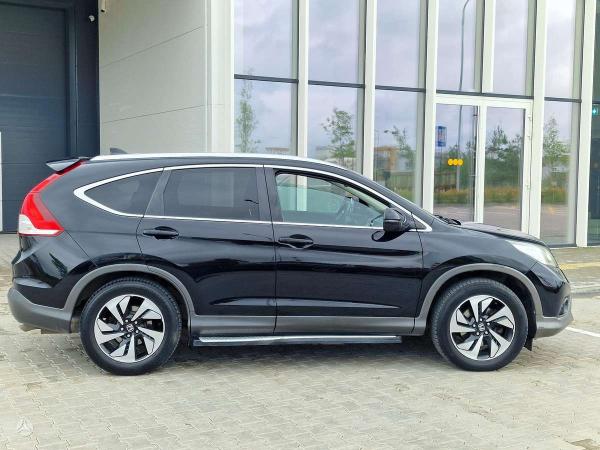 Black Honda CR-V 2014 in Vilnius, with an engine capacity of 2.20 L and mileage of 270 thousand km for 11999 €, photo 9 on AUTOMOTO.COM.LV