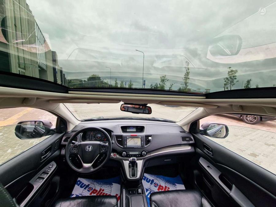 Black Honda CR-V 2014 in Vilnius, with an engine capacity of 2.20 L and mileage of 270 thousand km for 11999 €, photo 11 on AUTOMOTO.COM.LV
