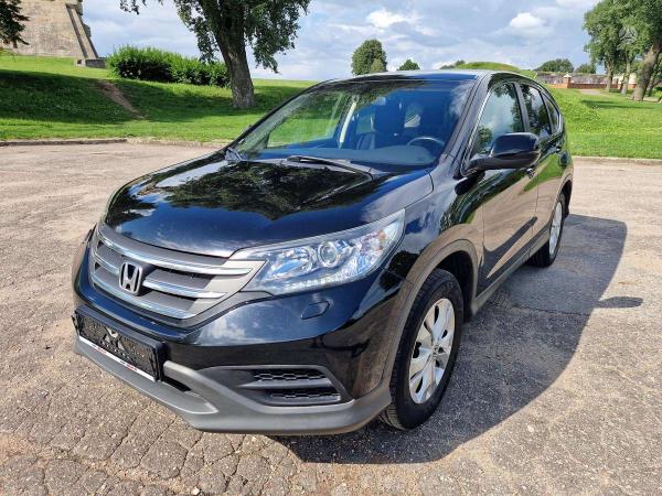 Black Honda CR-V 2014 in Kaunas, with an engine capacity of 2.20 L and mileage of 255 thousand km for 8500 €, photo 1 on AUTOMOTO.COM.LV