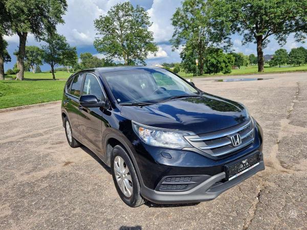 Black Honda CR-V 2014 in Kaunas, with an engine capacity of 2.20 L and mileage of 255 thousand km for 8500 €, photo 3 on AUTOMOTO.COM.LV