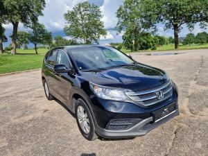 Black Honda CR-V 2014 in Kaunas, with an engine capacity of 2.20 L and mileage of 255 thousand km for 8500 €, photo 4 on AUTOMOTO.COM.LV