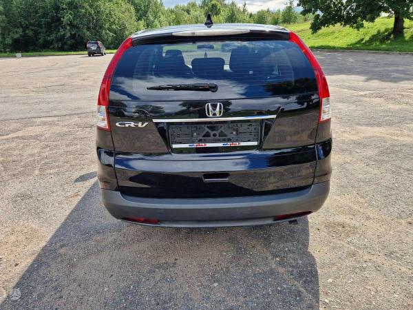 Black Honda CR-V 2014 in Kaunas, with an engine capacity of 2.20 L and mileage of 255 thousand km for 8500 €, photo 6 on AUTOMOTO.COM.LV