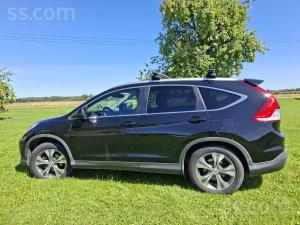 Black Honda CR-V 2014 in Daugavpils, with an engine capacity of 2.20 L and mileage of 307 thousand km for 9000 €, photo 3 on AUTOMOTO.COM.LV