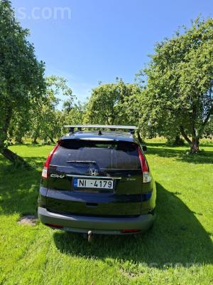 Black Honda CR-V 2014 in Daugavpils, with an engine capacity of 2.20 L and mileage of 307 thousand km for 9000 €, photo 5 on AUTOMOTO.COM.LV
