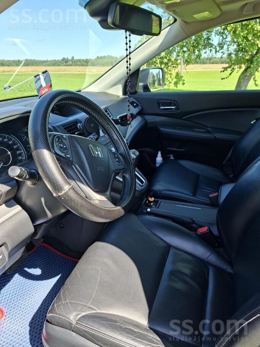 Black Honda CR-V 2014 in Daugavpils, with an engine capacity of 2.20 L and mileage of 307 thousand km for 9000 €, photo 11 on AUTOMOTO.COM.LV