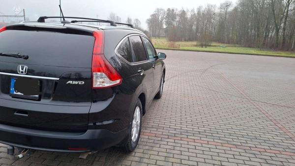 Black Honda CR-V 2014 in Telschi, with an engine capacity of 2.40 L and mileage of 222 thousand km for 11250 €, photo 3 on AUTOMOTO.COM.LV
