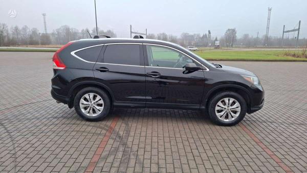 Black Honda CR-V 2014 in Telschi, with an engine capacity of 2.40 L and mileage of 222 thousand km for 11250 €, photo 4 on AUTOMOTO.COM.LV
