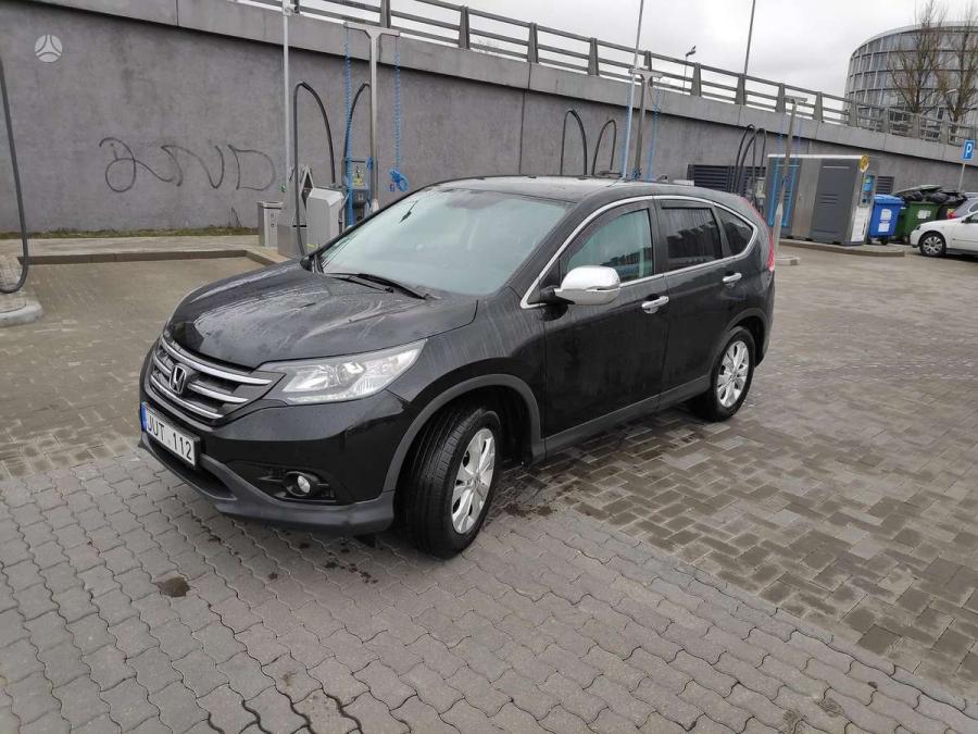 Black Honda CR-V 2014 in Panevezys, with an engine capacity of 1.60 L and mileage of 164 thousand km for 8299 €, photo 3 on AUTOMOTO.COM.LV