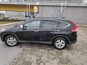 Black Honda CR-V 2014 in Panevezys, with an engine capacity of 1.60 L and mileage of 164 thousand km for 8299 €, photo 4 on AUTOMOTO.COM.LV