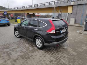 Black Honda CR-V 2014 in Panevezys, with an engine capacity of 1.60 L and mileage of 164 thousand km for 8299 €, photo 5 on AUTOMOTO.COM.LV