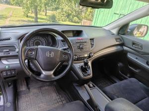 Black Honda CR-V 2014 in Panevezys, with an engine capacity of 1.60 L and mileage of 164 thousand km for 8299 €, photo 12 on AUTOMOTO.COM.LV