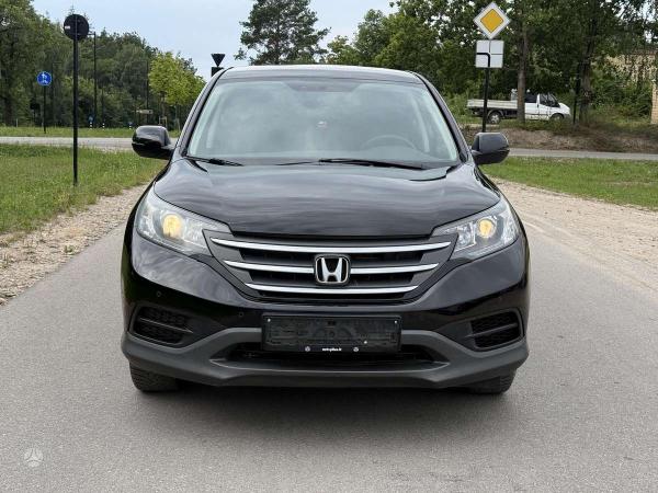 Black Honda CR-V 2014 in Alytus, with an engine capacity of 1.60 L and mileage of 211 thousand km for 8350 €, photo 3 on AUTOMOTO.COM.LV