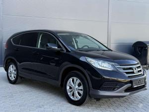 Black Honda CR-V 2014 in Siauliai, with an engine capacity of 2.20 L and mileage of 225 thousand km for 11999 €, photo 4 on AUTOMOTO.COM.LV