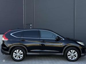 Black Honda CR-V 2014 in Siauliai, with an engine capacity of 2.20 L and mileage of 225 thousand km for 11999 €, photo 7 on AUTOMOTO.COM.LV