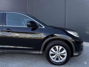 Black Honda CR-V 2014 in Siauliai, with an engine capacity of 2.20 L and mileage of 225 thousand km for 11999 €, photo 15 on AUTOMOTO.COM.LV