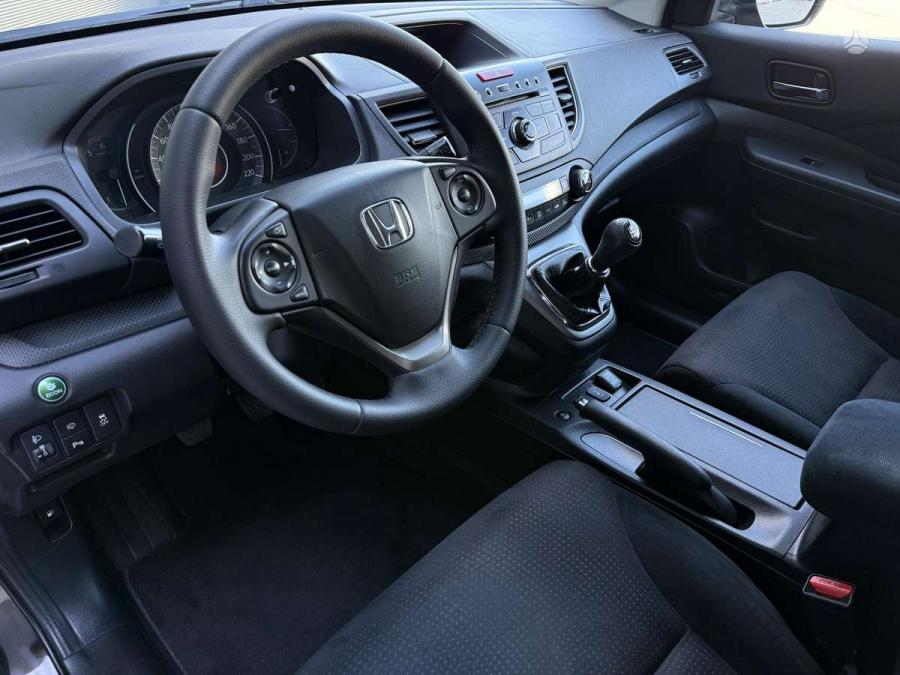 Black Honda CR-V 2014 in Siauliai, with an engine capacity of 2.20 L and mileage of 225 thousand km for 11999 €, photo 19 on AUTOMOTO.COM.LV