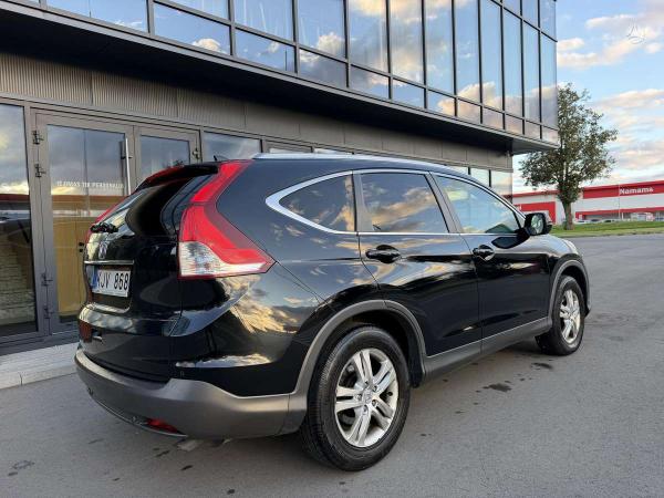 Black Honda CR-V 2014 in Kaunas, with an engine capacity of 2.20 L and mileage of 301 thousand km for 7800 €, photo 3 on AUTOMOTO.COM.LV