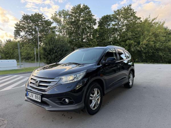 Black Honda CR-V 2014 in Kaunas, with an engine capacity of 2.20 L and mileage of 301 thousand km for 7800 €, photo 5 on AUTOMOTO.COM.LV