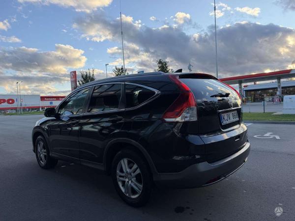 Black Honda CR-V 2014 in Kaunas, with an engine capacity of 2.20 L and mileage of 301 thousand km for 7800 €, photo 8 on AUTOMOTO.COM.LV
