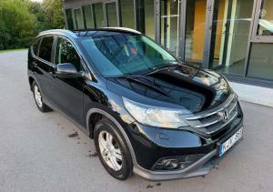 Black Honda CR-V 2014 in Vilnius, with an engine capacity of 2.20 L and mileage of 311 thousand km for 7400 €, photo 4 on AUTOMOTO.COM.LV
