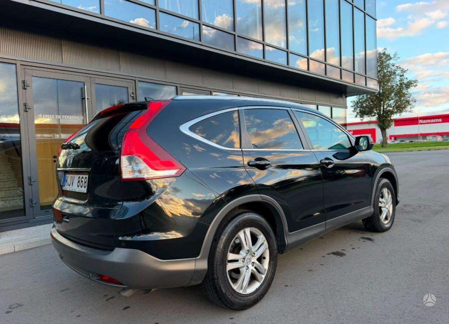 Black Honda CR-V 2014 in Vilnius, with an engine capacity of 2.20 L and mileage of 311 thousand km for 7400 €, photo 5 on AUTOMOTO.COM.LV