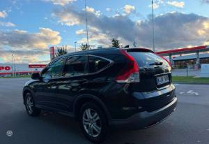 Black Honda CR-V 2014 in Vilnius, with an engine capacity of 2.20 L and mileage of 311 thousand km for 7400 €, photo 6 on AUTOMOTO.COM.LV