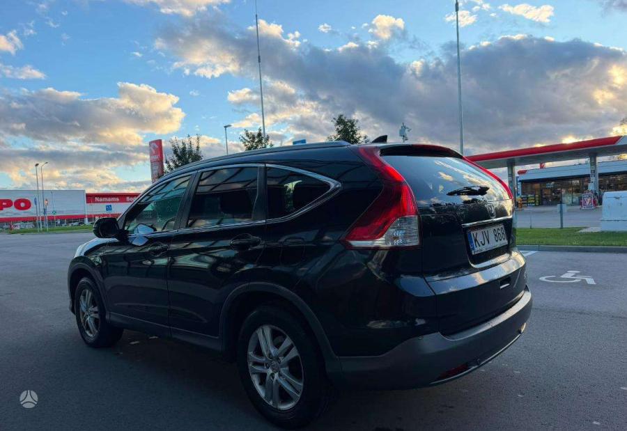 Black Honda CR-V 2014 in Vilnius, with an engine capacity of 2.20 L and mileage of 311 thousand km for 7400 €, photo 6 on AUTOMOTO.COM.LV