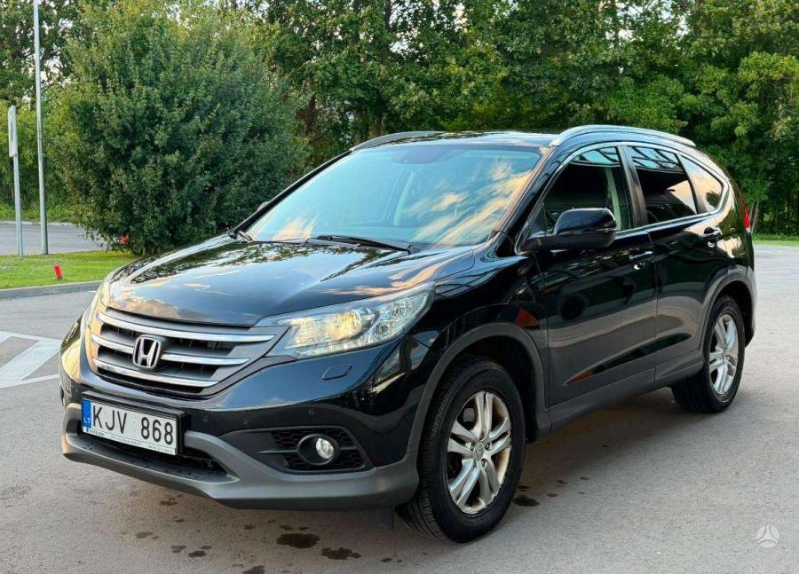 Black Honda CR-V 2014 in Vilnius, with an engine capacity of 2.20 L and mileage of 311 thousand km for 7400 €, photo 7 on AUTOMOTO.COM.LV