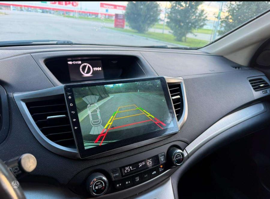 Black Honda CR-V 2014 in Vilnius, with an engine capacity of 2.20 L and mileage of 311 thousand km for 7400 €, photo 15 on AUTOMOTO.COM.LV