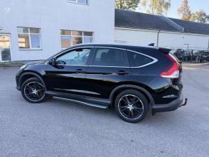 Black Honda CR-V 2014 in Ukmerge, with an engine capacity of 2.20 L and mileage of 345 thousand km for 7000 €, photo 6 on AUTOMOTO.COM.LV