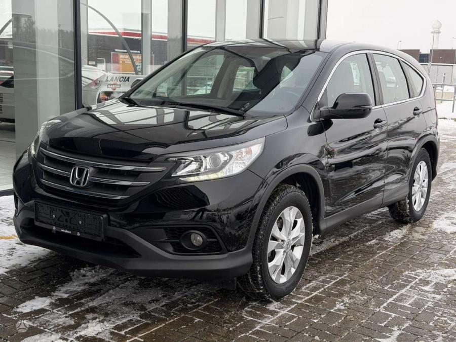 Black Honda CR-V 2015 in Vilnius, with an engine capacity of 1.60 L and mileage of 188 thousand km for 11555 €, photo 2 on AUTOMOTO.COM.LV