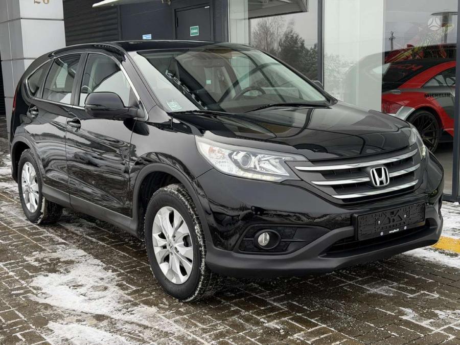 Black Honda CR-V 2015 in Vilnius, with an engine capacity of 1.60 L and mileage of 188 thousand km for 11555 €, photo 7 on AUTOMOTO.COM.LV