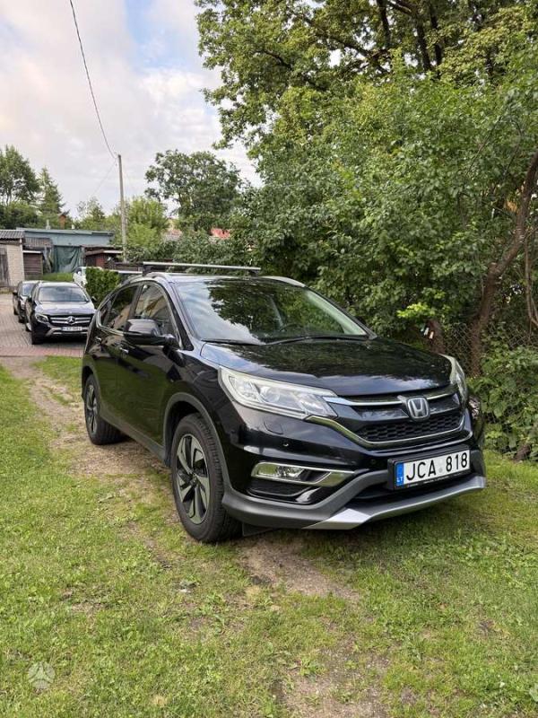 Melns Honda CR-V 2015 Viļņa, ar dzinēja tilpumu 2.00 L un nobraukumu 200 tūkst. km par 14499 €, foto 1 vietnē AUTOMOTO.COM.LV
