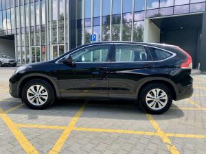 Black Honda CR-V 2015 in Vilnius, with an engine capacity of 1.60 L and mileage of 262 thousand km for 7950 €, photo 3 on AUTOMOTO.COM.LV