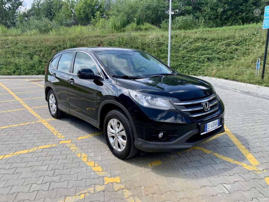 Black Honda CR-V 2015 in Vilnius, with an engine capacity of 1.60 L and mileage of 262 thousand km for 7950 €, photo 8 on AUTOMOTO.COM.LV