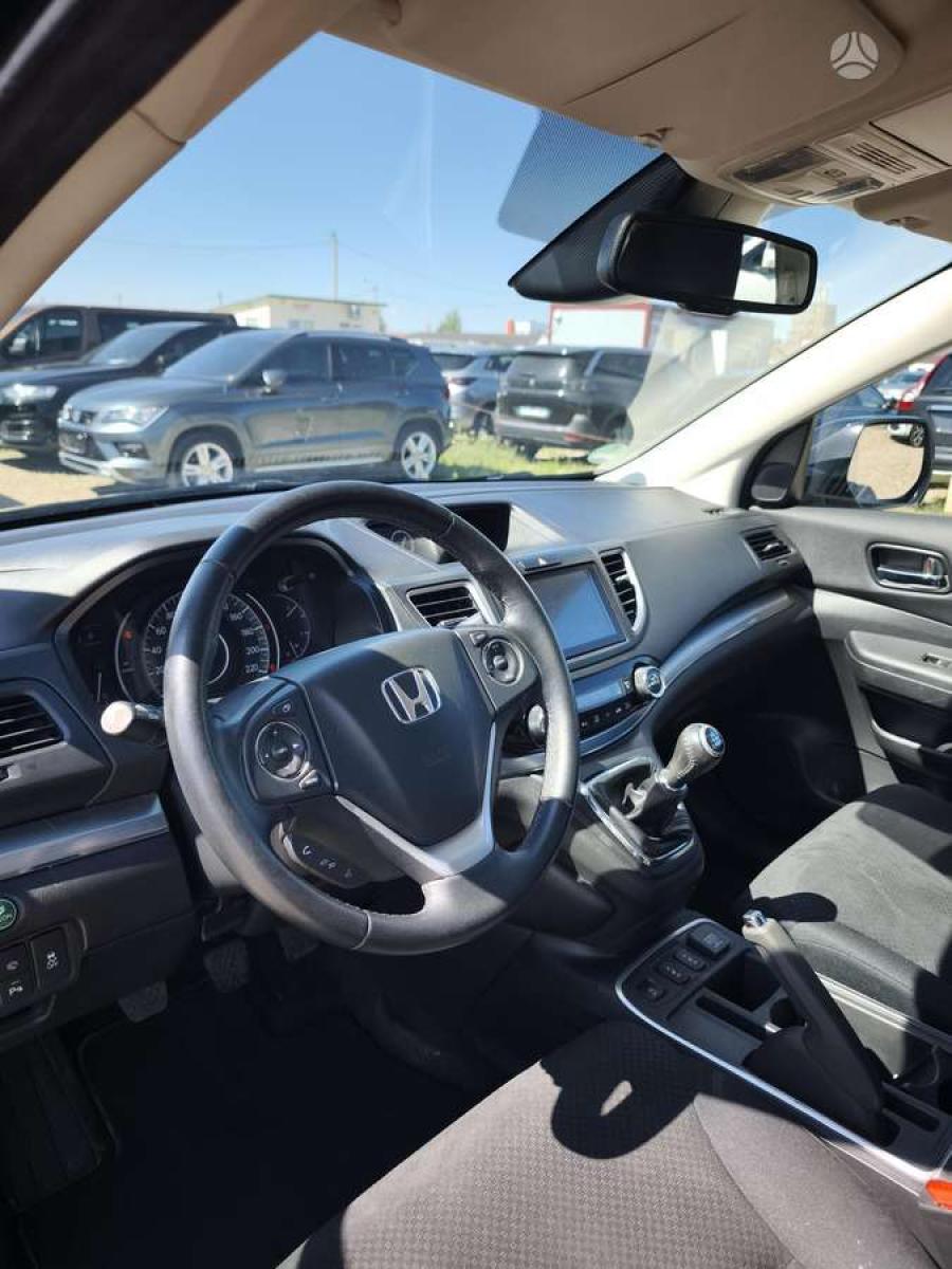 Black Honda CR-V 2015 in Vilnius, with an engine capacity of 2.00 L and mileage of 177 thousand km for 14650 €, photo 17 on AUTOMOTO.COM.LV