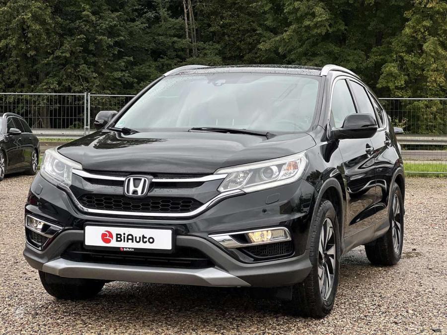 Black Honda CR-V 2015 in Utena, with an engine capacity of 1.60 L and mileage of 248 thousand km for 10900 €, photo 4 on AUTOMOTO.COM.LV