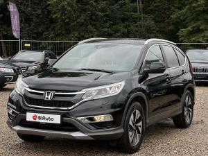 Black Honda CR-V 2015 in Utena, with an engine capacity of 1.60 L and mileage of 248 thousand km for 10900 €, photo 6 on AUTOMOTO.COM.LV