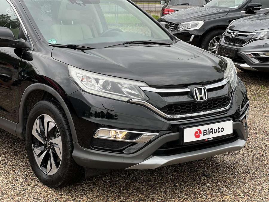 Black Honda CR-V 2015 in Utena, with an engine capacity of 1.60 L and mileage of 248 thousand km for 10900 €, photo 24 on AUTOMOTO.COM.LV