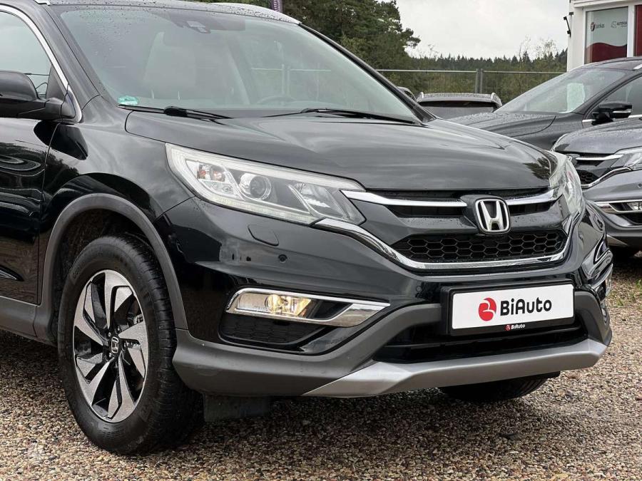 Black Honda CR-V 2015 in Utena, with an engine capacity of 1.60 L and mileage of 248 thousand km for 10900 €, photo 27 on AUTOMOTO.COM.LV