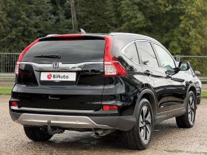 Black Honda CR-V 2015 in Utena, with an engine capacity of 1.60 L and mileage of 248 thousand km for 10900 €, photo 50 on AUTOMOTO.COM.LV