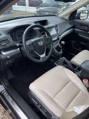 Black Honda CR-V 2015 in Utena, with an engine capacity of 1.60 L and mileage of 248 thousand km for 10900 €, photo 60 on AUTOMOTO.COM.LV
