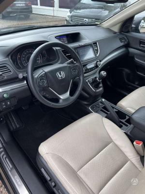 Black Honda CR-V 2015 in Utena, with an engine capacity of 1.60 L and mileage of 248 thousand km for 10900 €, photo 64 on AUTOMOTO.COM.LV