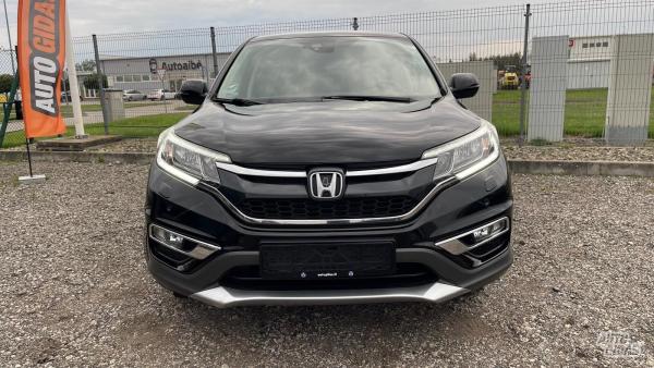 Black Honda CR-V 2015 in Marijampole, with an engine capacity of 1.60 L and mileage of 248 thousand km for 10990 €, photo 6 on AUTOMOTO.COM.LV