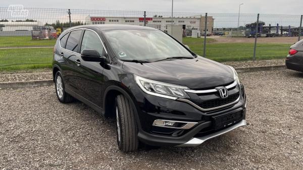 Black Honda CR-V 2015 in Marijampole, with an engine capacity of 1.60 L and mileage of 248 thousand km for 10990 €, photo 7 on AUTOMOTO.COM.LV