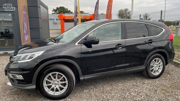Black Honda CR-V 2015 in Marijampole, with an engine capacity of 1.60 L and mileage of 248 thousand km for 10990 €, photo 8 on AUTOMOTO.COM.LV