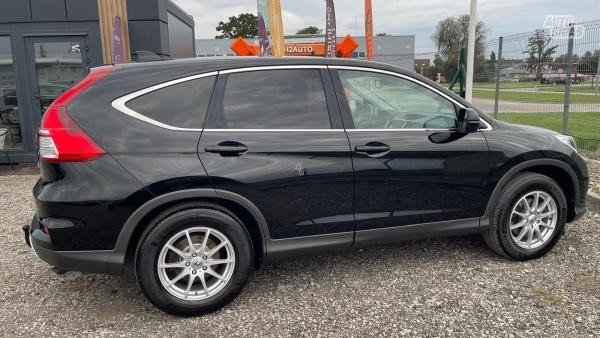 Black Honda CR-V 2015 in Marijampole, with an engine capacity of 1.60 L and mileage of 248 thousand km for 10990 €, photo 9 on AUTOMOTO.COM.LV