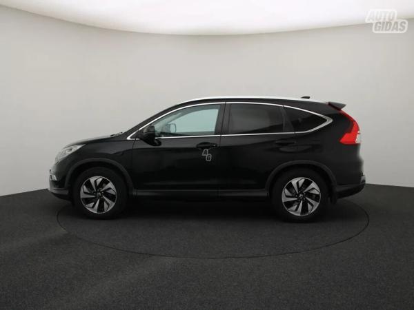 Black Honda CR-V 2016 in Vilnius, with an engine capacity of 1.60 L and mileage of 194 thousand km for 15699 €, photo 6 on AUTOMOTO.COM.LV